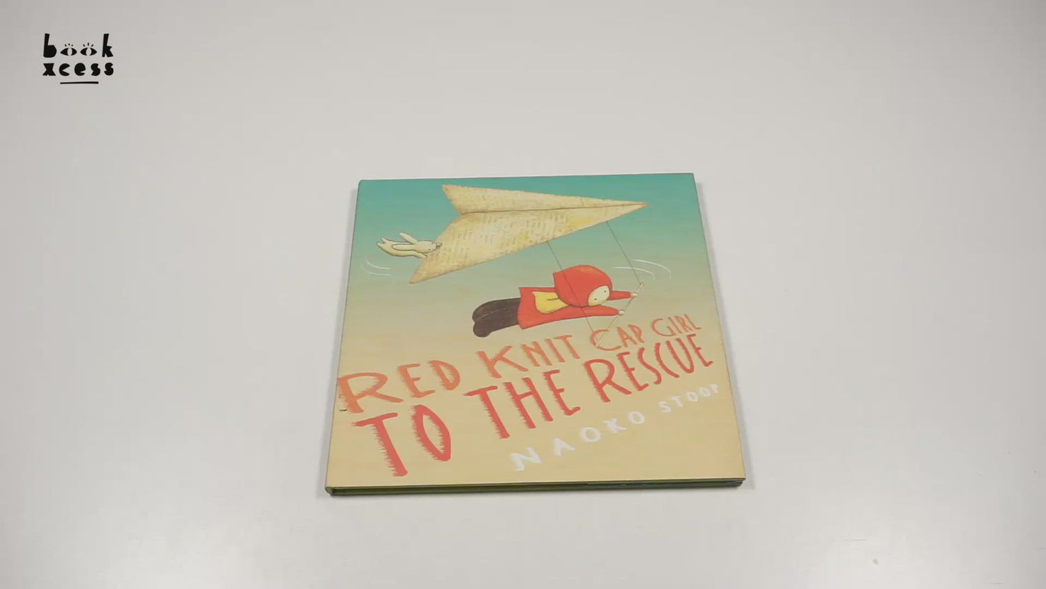 Red Knit Cap Girl To The Rescue – BookXcess